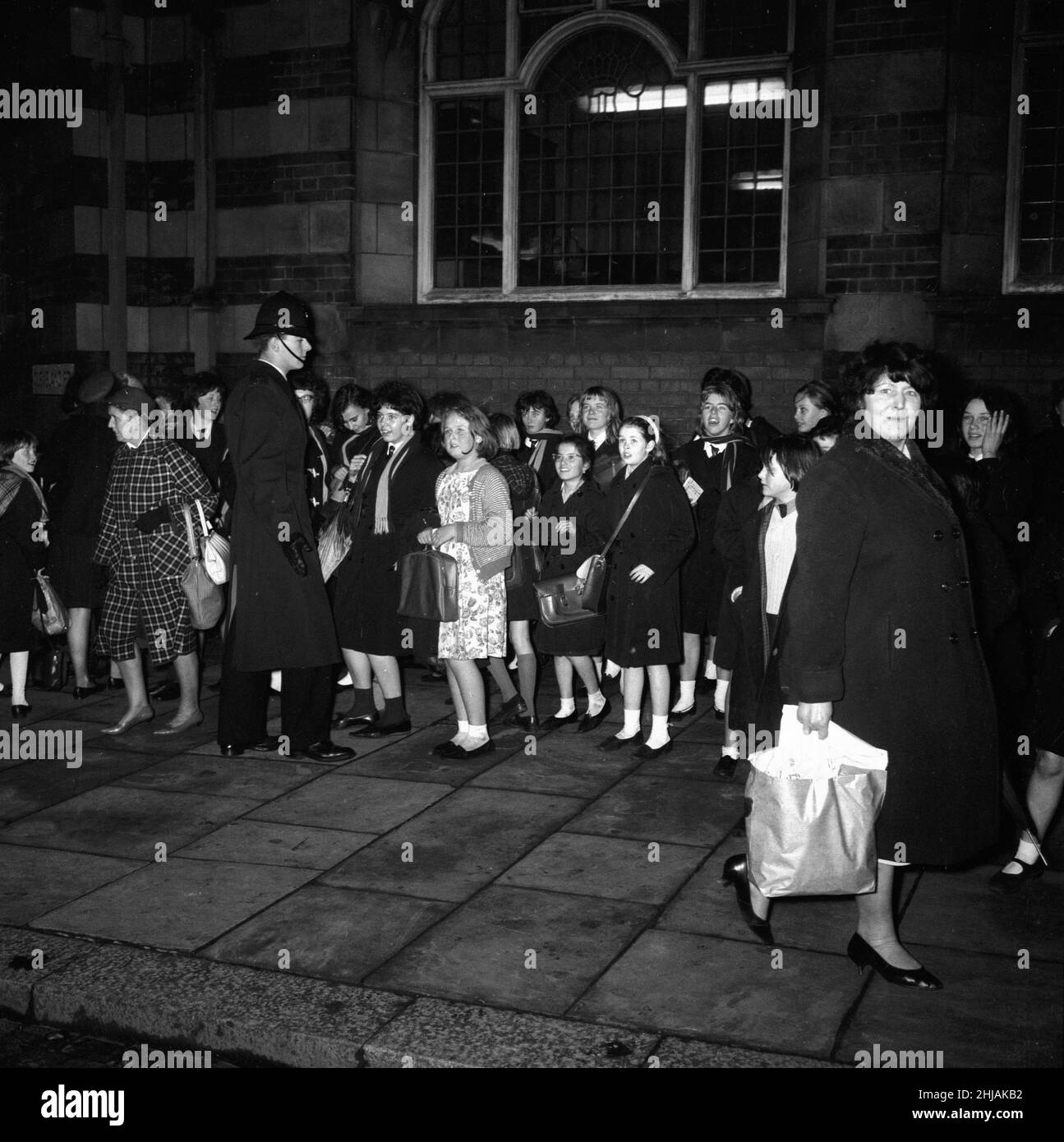 The Beatles play Wolverhampton. Fans queuing outside The Gaumont Cinema ...
