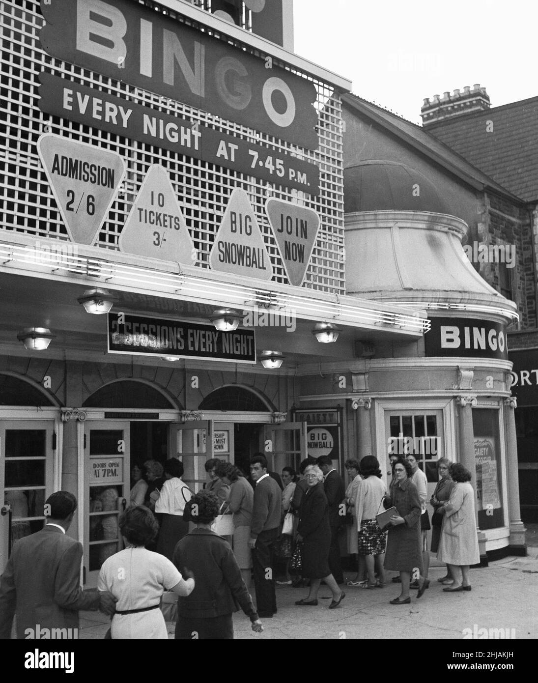People queue outside the Gaiety Theatre, to play bingo. 31st July 1963 ...