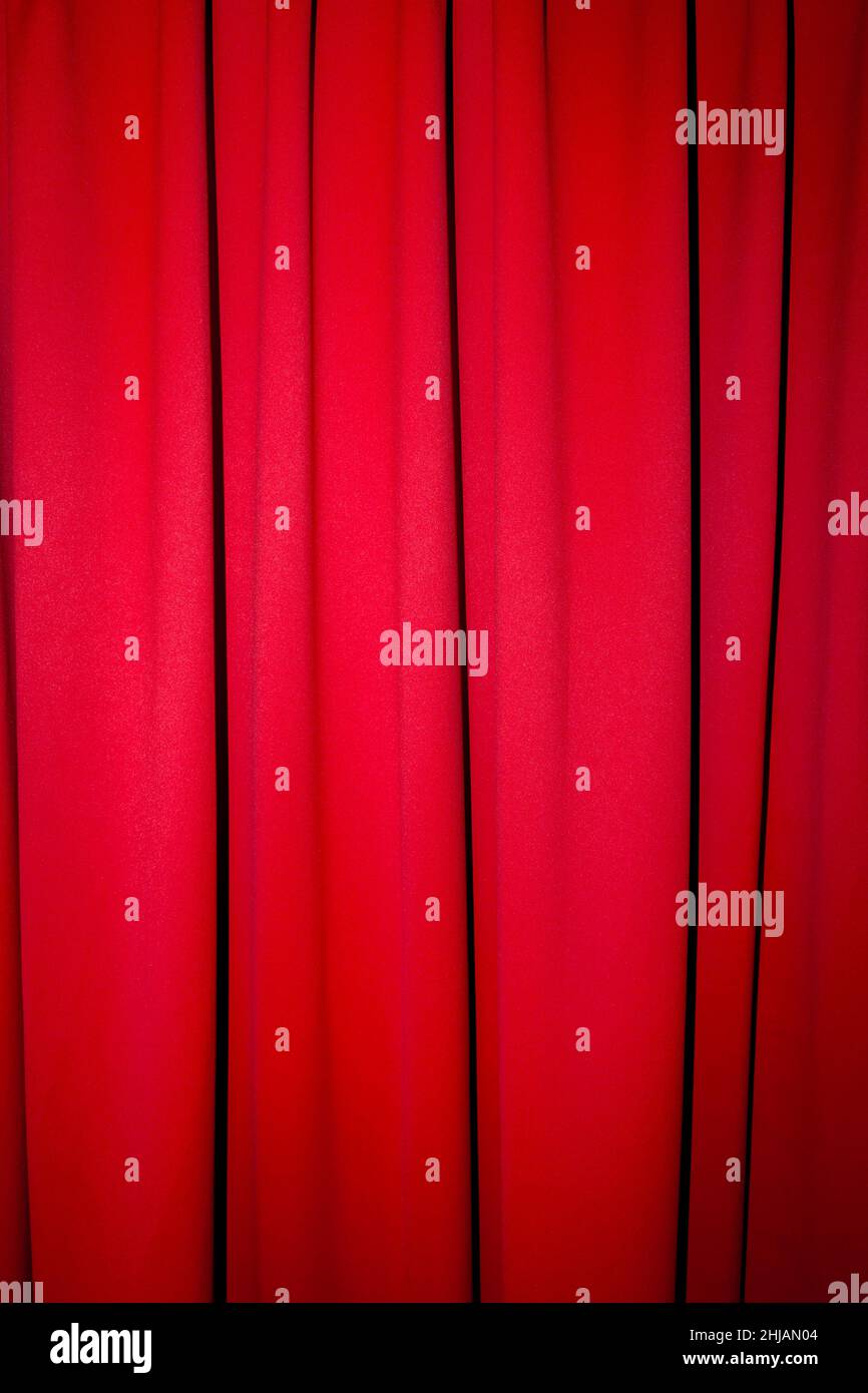 Red closed curtain with a light spot use for background Stock Photo - Alamy