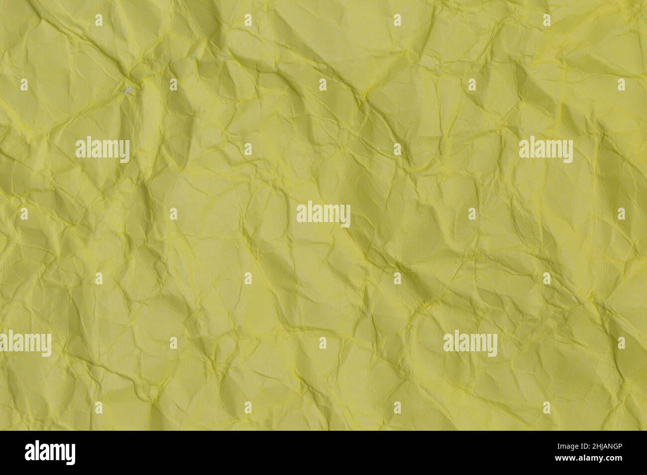 Crumpled yellow paper background Stock Photo - Alamy