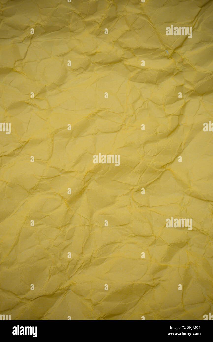 Crumpled yellow paper hi-res stock photography and images - Alamy