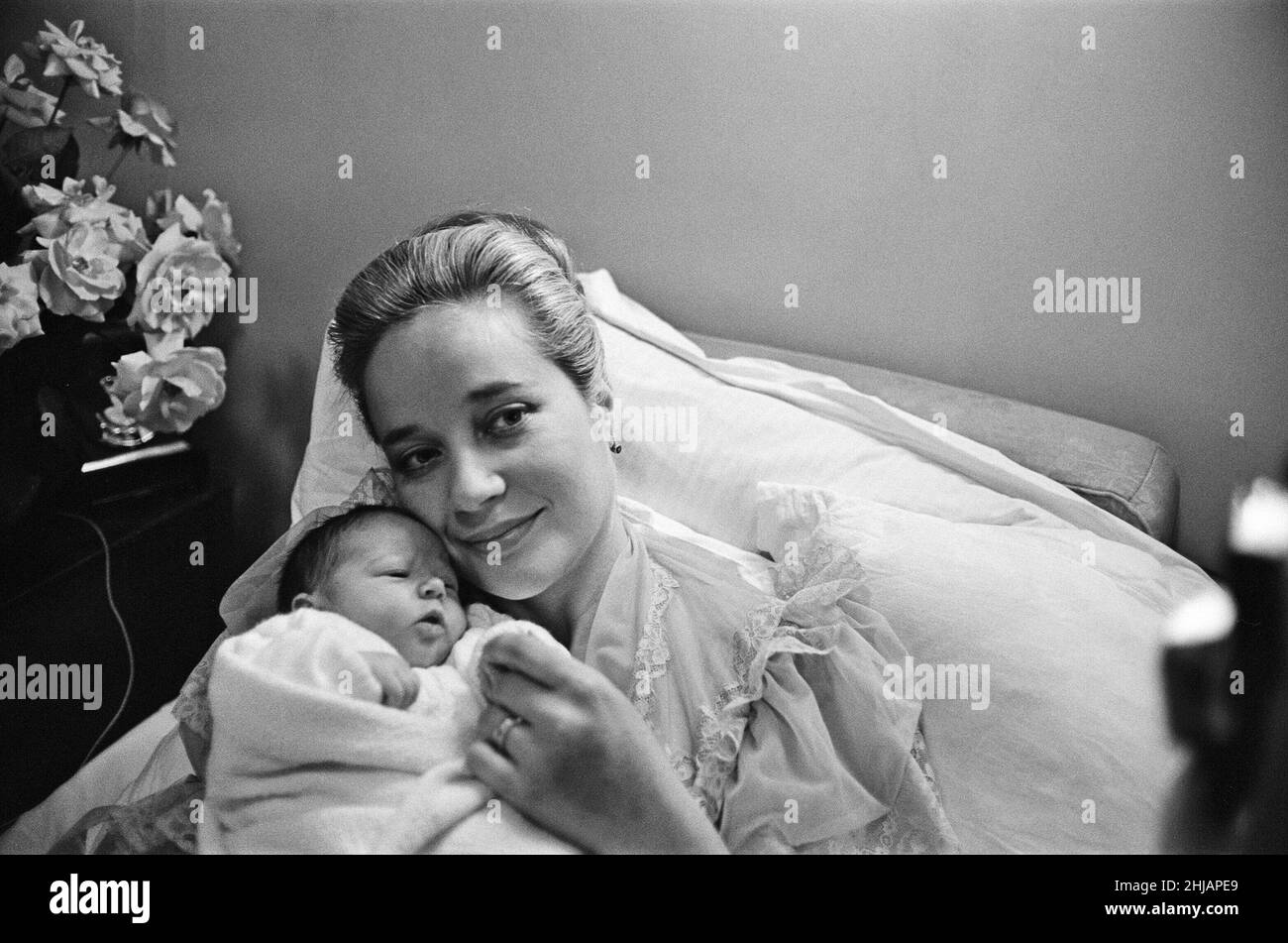 Sylvia Syms, actor and star of Ice Cold In Alex, with her new born baby ...