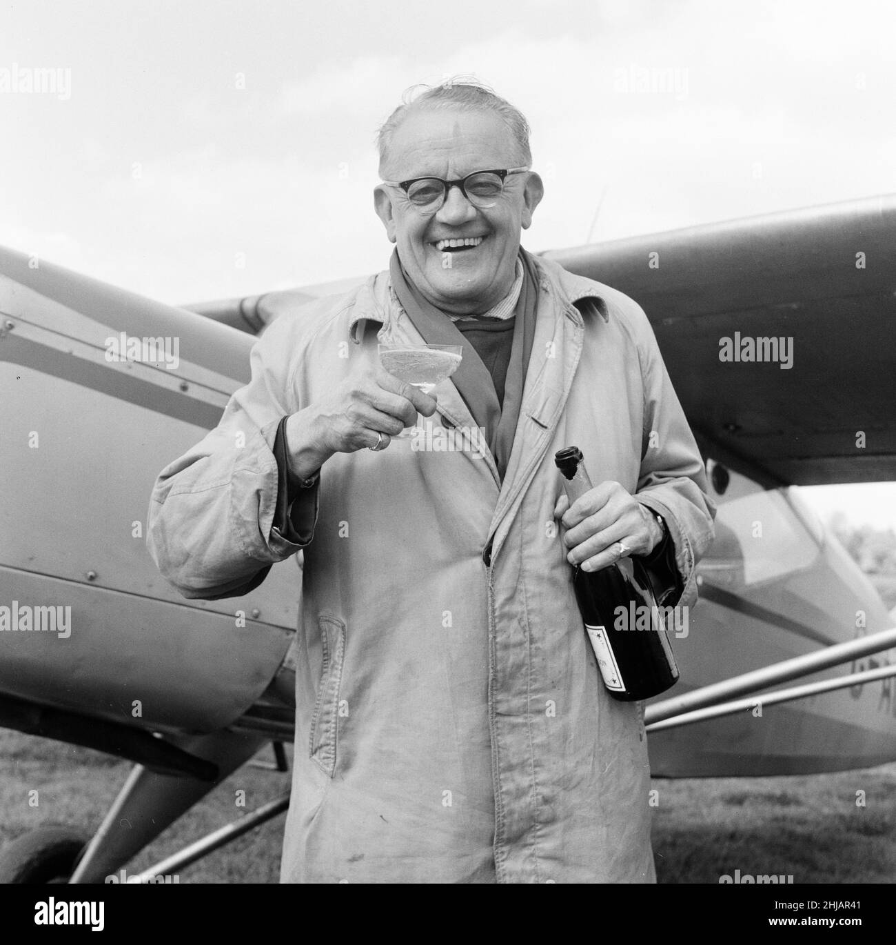 Hanging celebrates Black and White Stock Photos & Images - Alamy