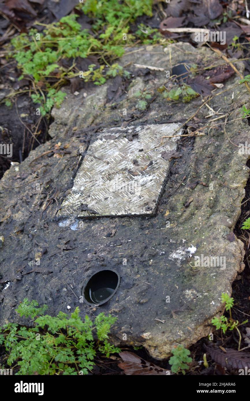 slab of concrete with metal plate Stock Photo - Alamy