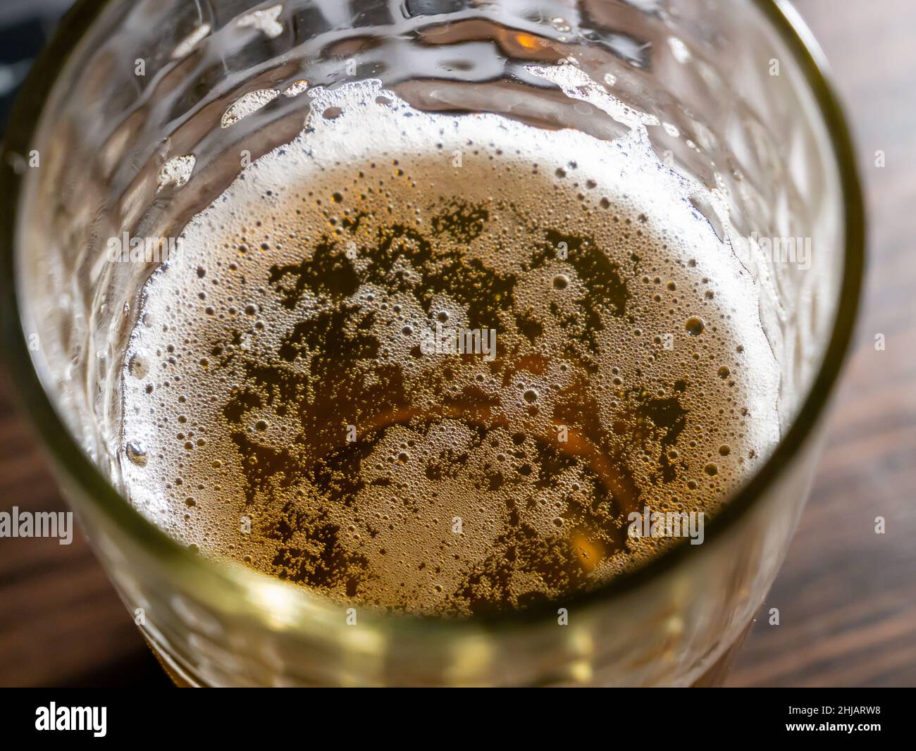 Beer bubble on the rim of a beer glass Stock Photo - Alamy