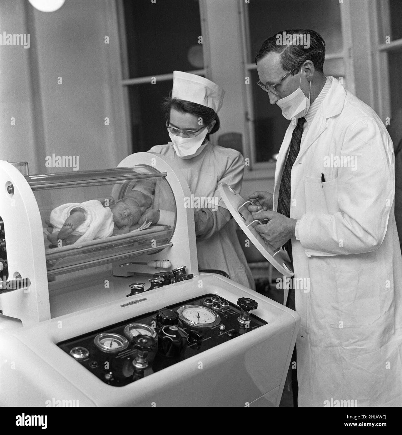A premature baby in one of the machines that can save new born babies ...