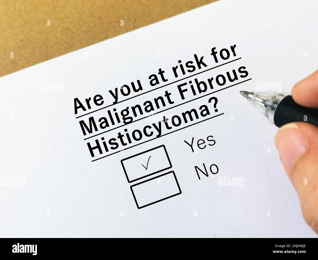 One person is answering question about cancer risk. He is at risk for ...