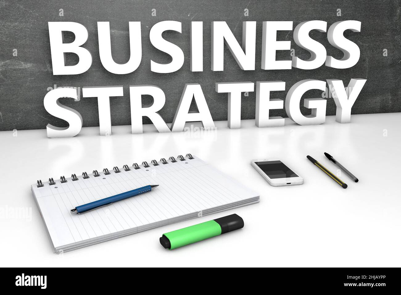 Business Strategy - text concept with chalkboard, notebook, pens and ...