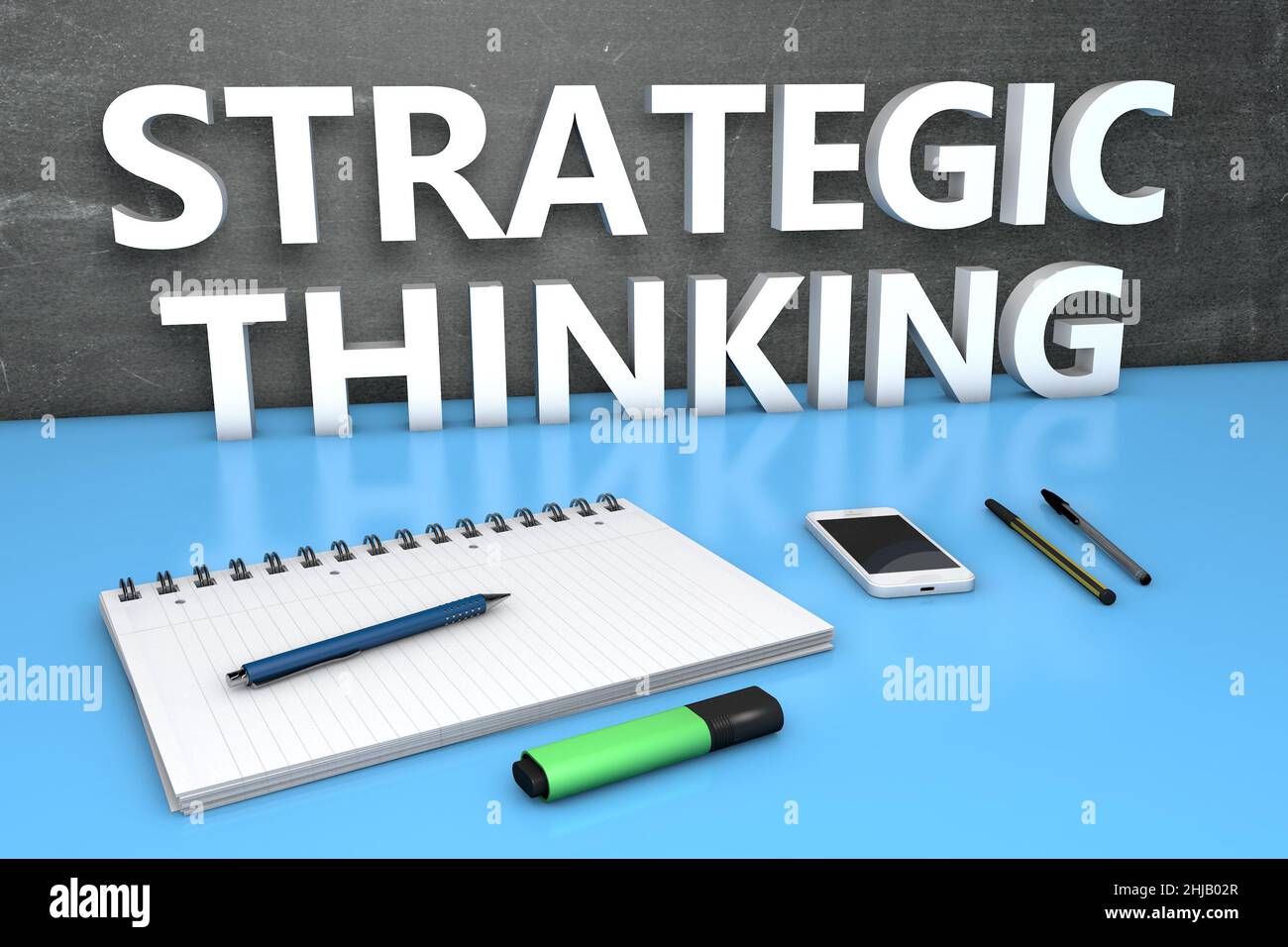 Strategic Thinking - text concept with chalkboard, notebook, pens and ...