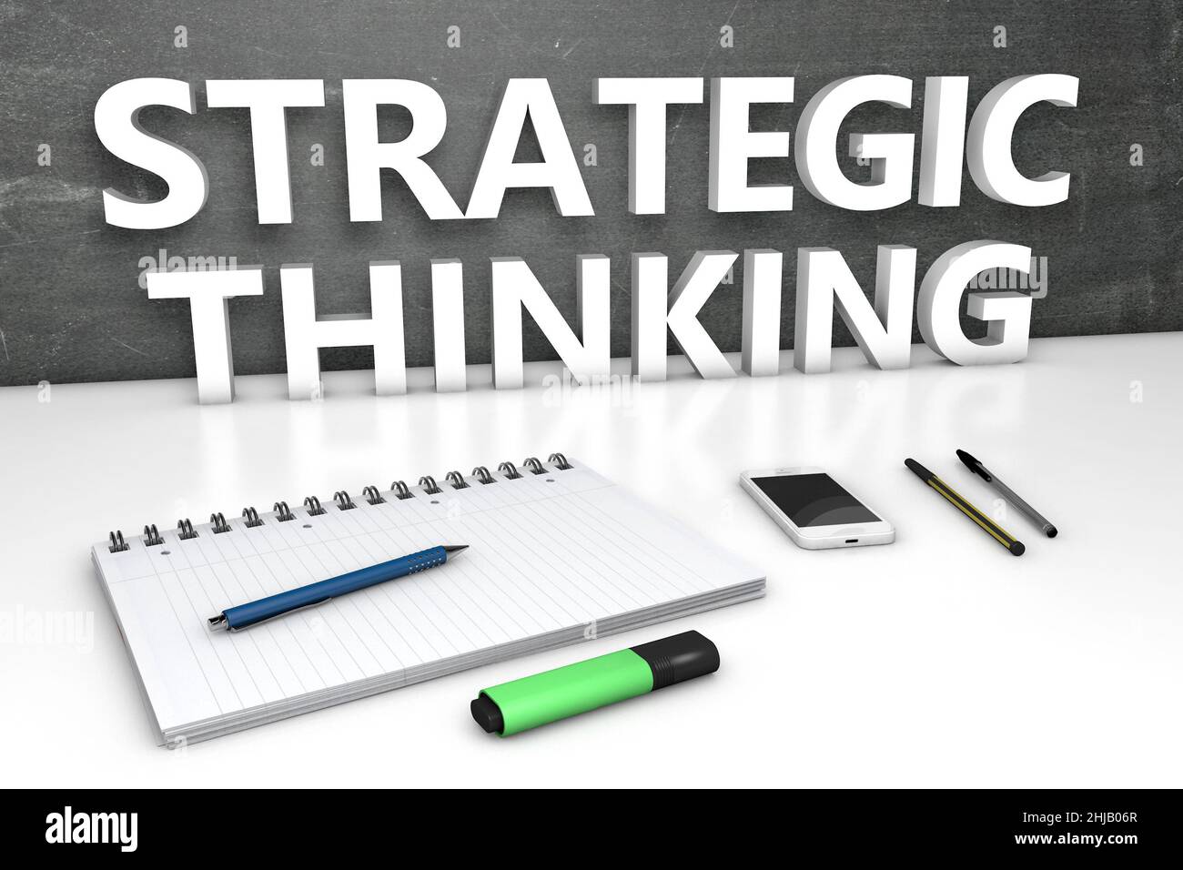 Strategic Thinking - text concept with chalkboard, notebook, pens and ...
