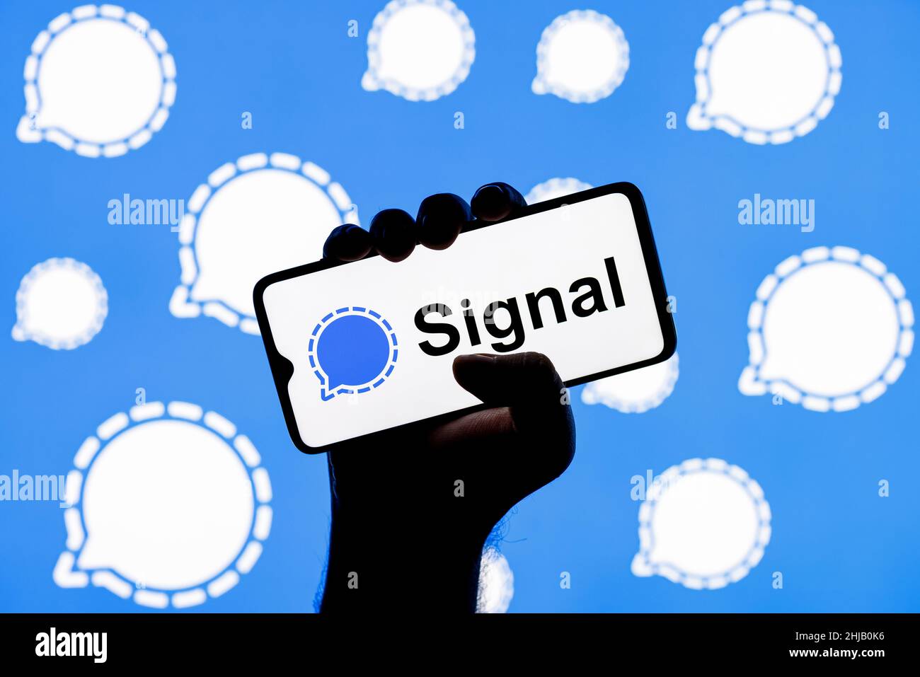 Smartphone with the Signal encrypted instant messaging service logo on ...