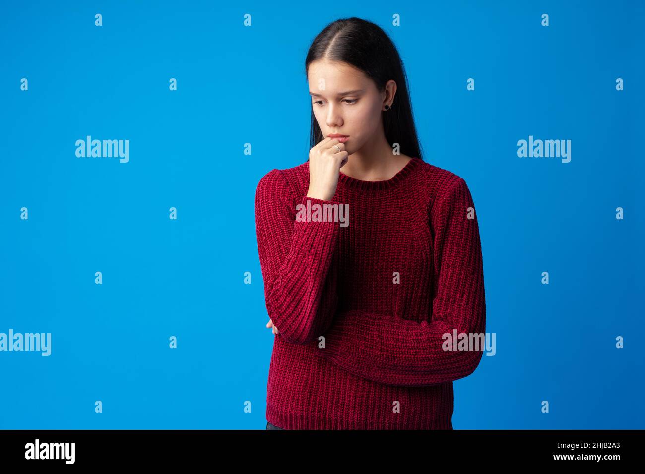 Portrait of pretty teen girl thinking and creating solution against ...