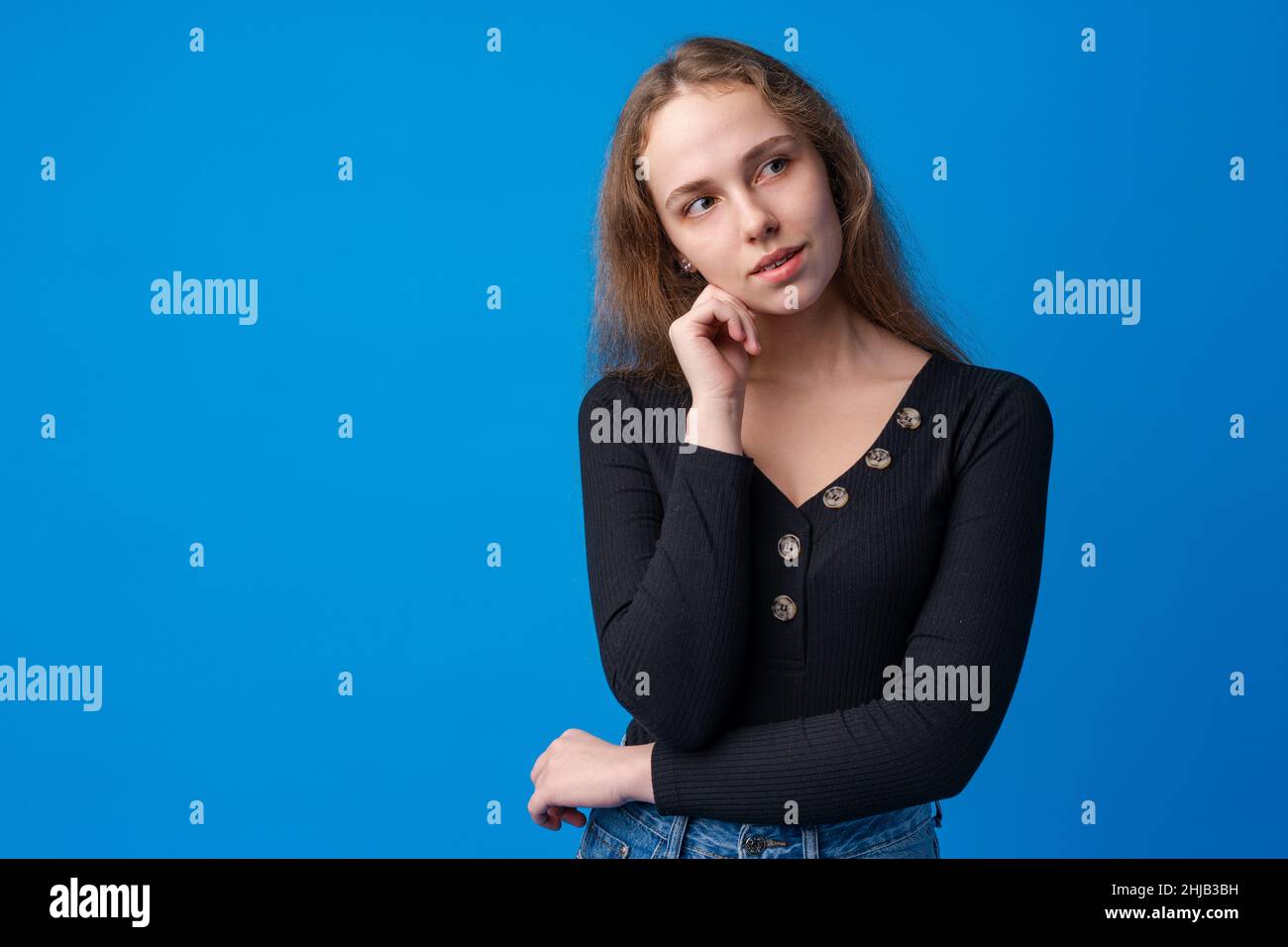 Portrait of pretty teen girl thinking and creating solution against ...
