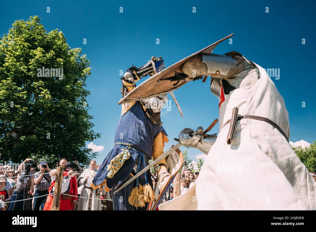 Knights In Fight With Sword. Restoration Of Knightly Battle Stock Photo ...