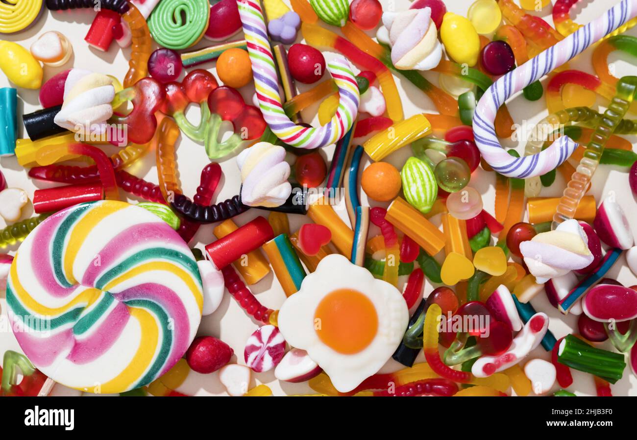 A top view of an arrangement of different colored candies Stock Photo ...