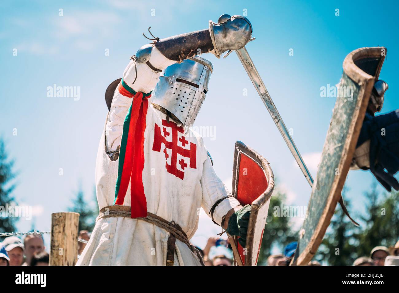 Knights In Fight With Sword. Restoration Of Knightly Battle Stock Photo ...