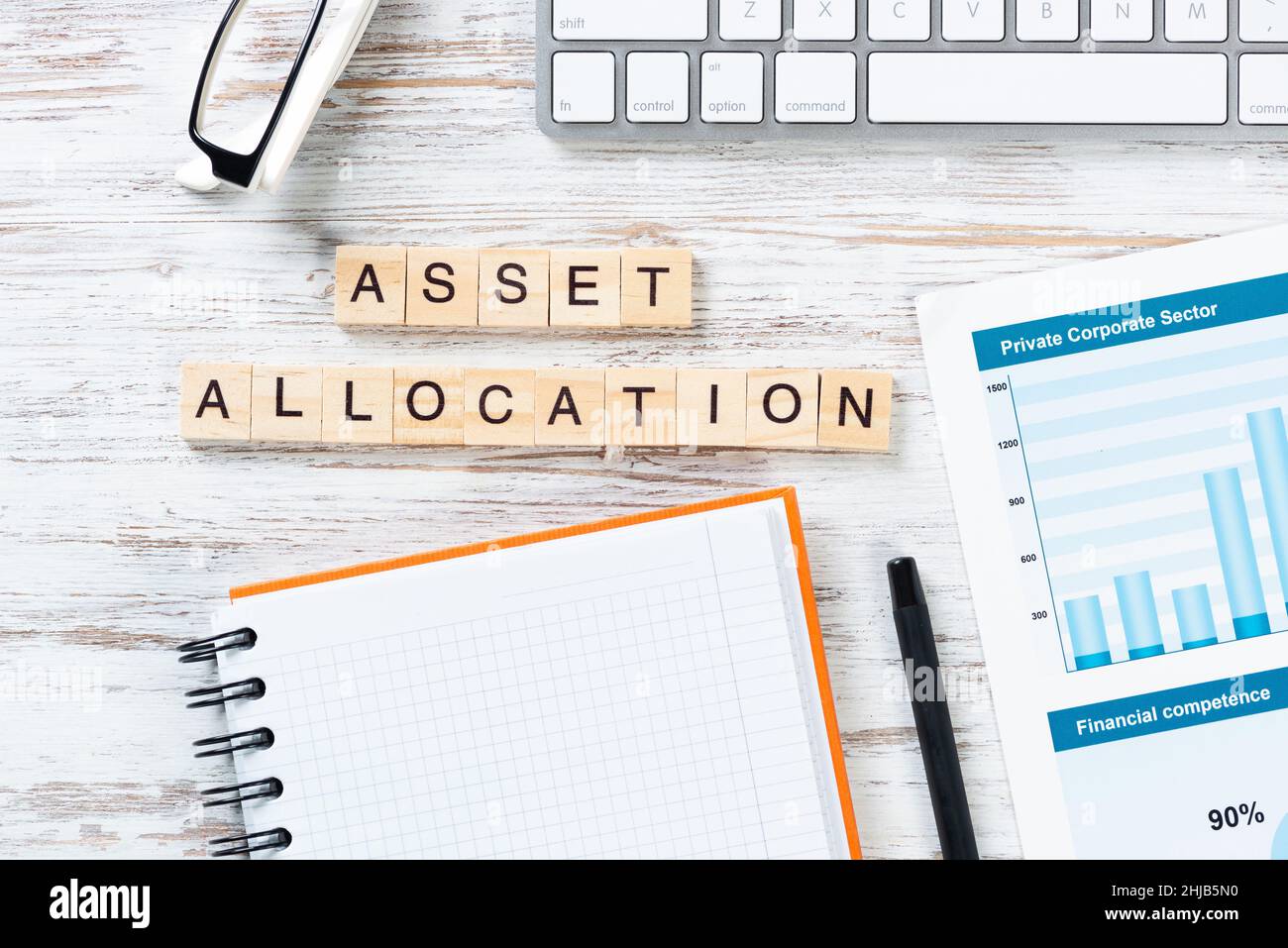 Asset allocation concept with letters on cubes Stock Photo - Alamy