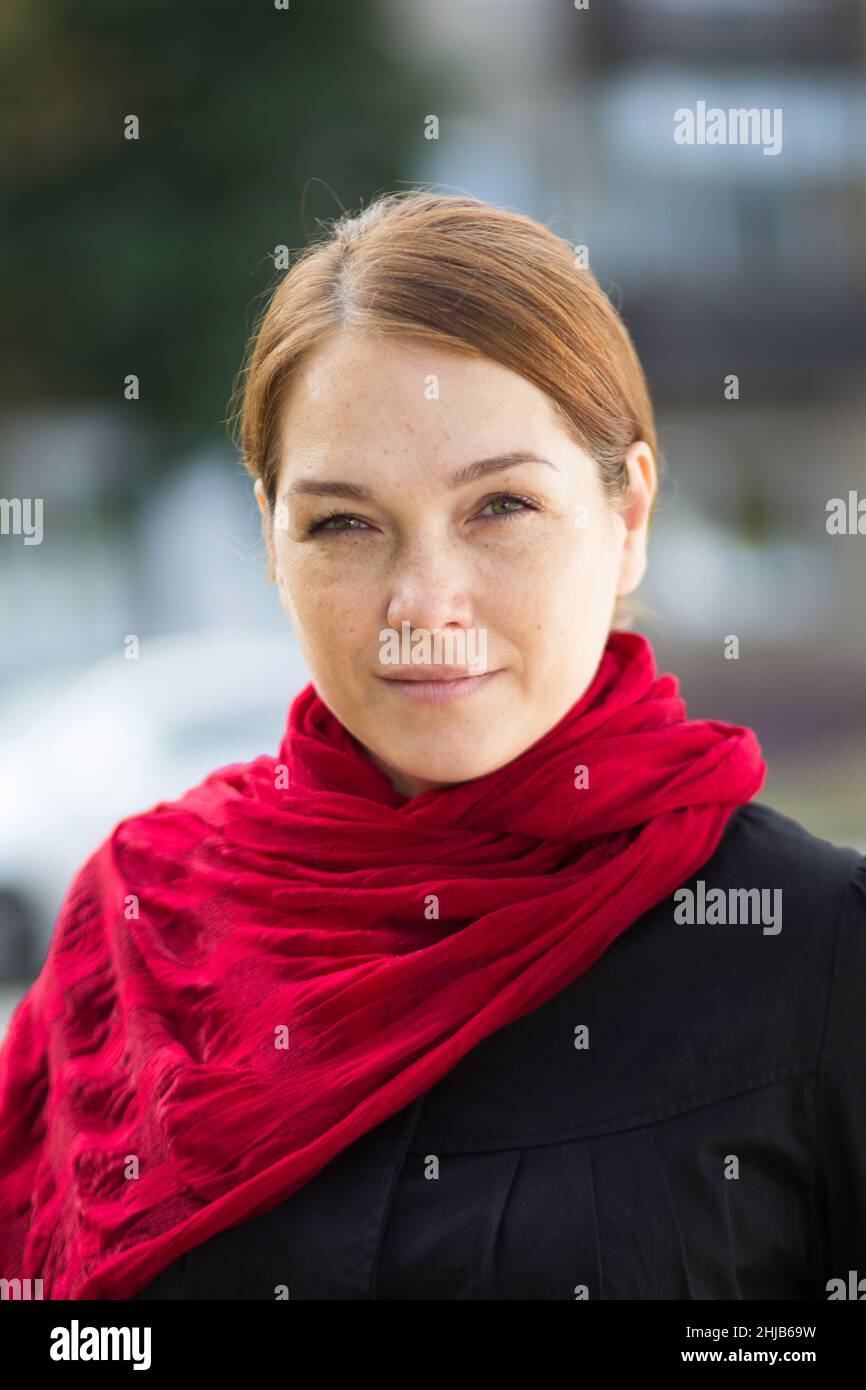 Portrait of caucasian middle aged woman looking at camera with soft ...