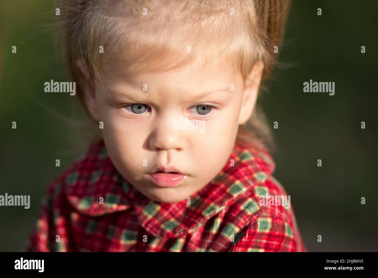Portrait of caucasian child of two years with serious look Stock Photo ...