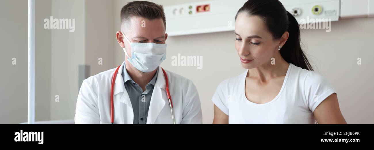 Doctor conducts medical examination of female patient in clinic Stock ...