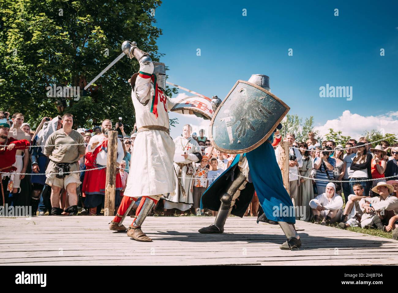 Knights In Fight With Sword. Restoration Of Knightly Battle Stock Photo ...