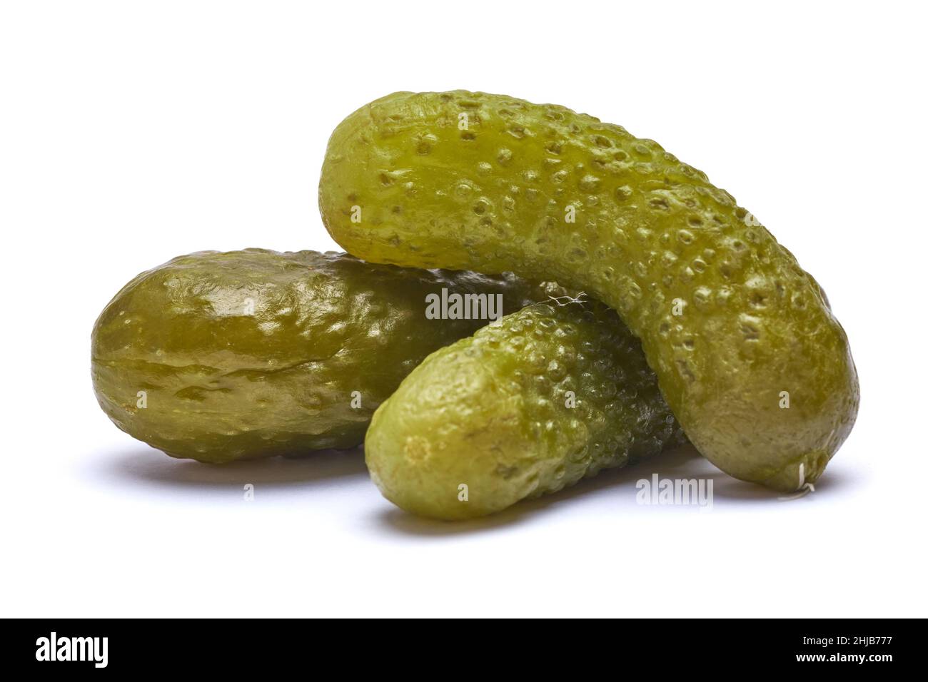 Tasty Whole green cornichon isolated on a white background Stock Photo ...