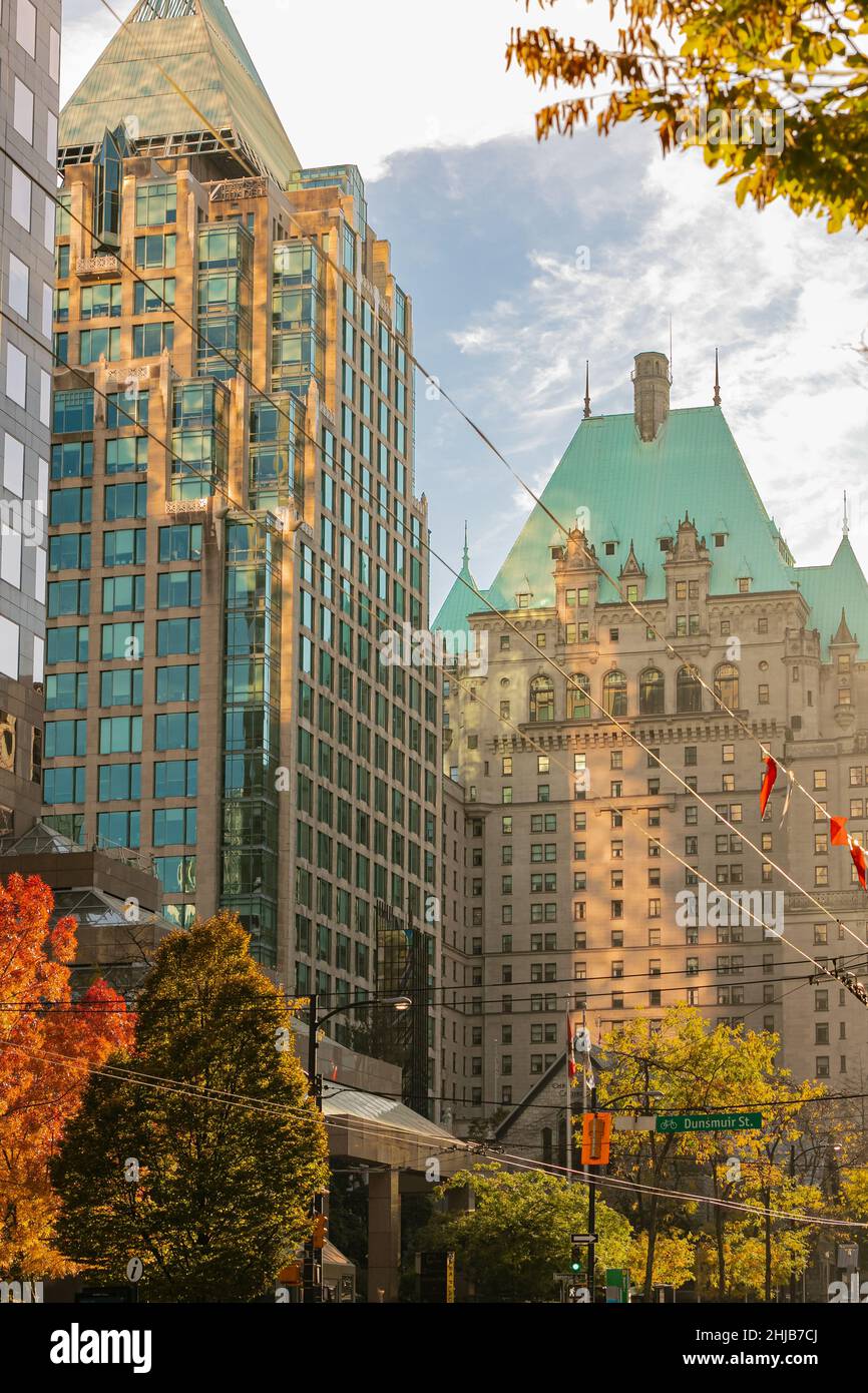 Sunset seen in huge buildings and beautiful skyscrapers in downtown of ...