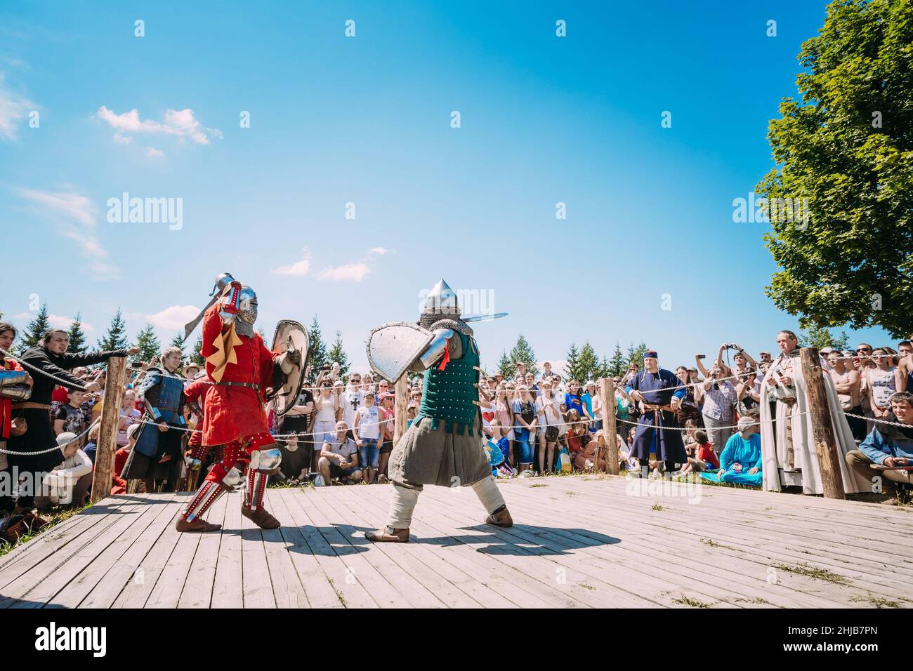 Knights In Fight With Sword. Restoration Of Knightly Battle Stock Photo ...