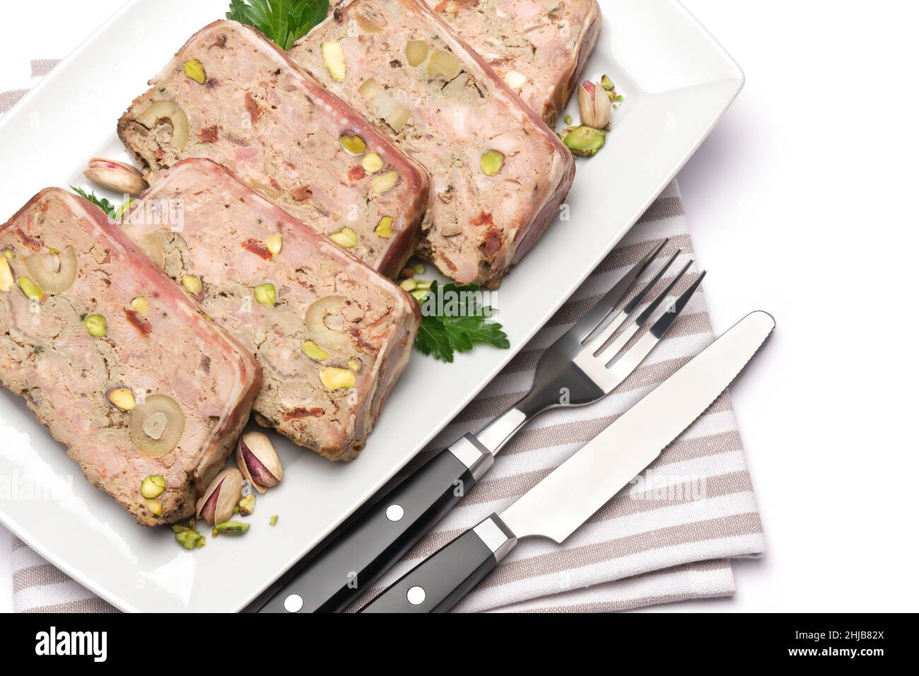 Sliced Traditional French terrine covered with bacon isolated on white ...