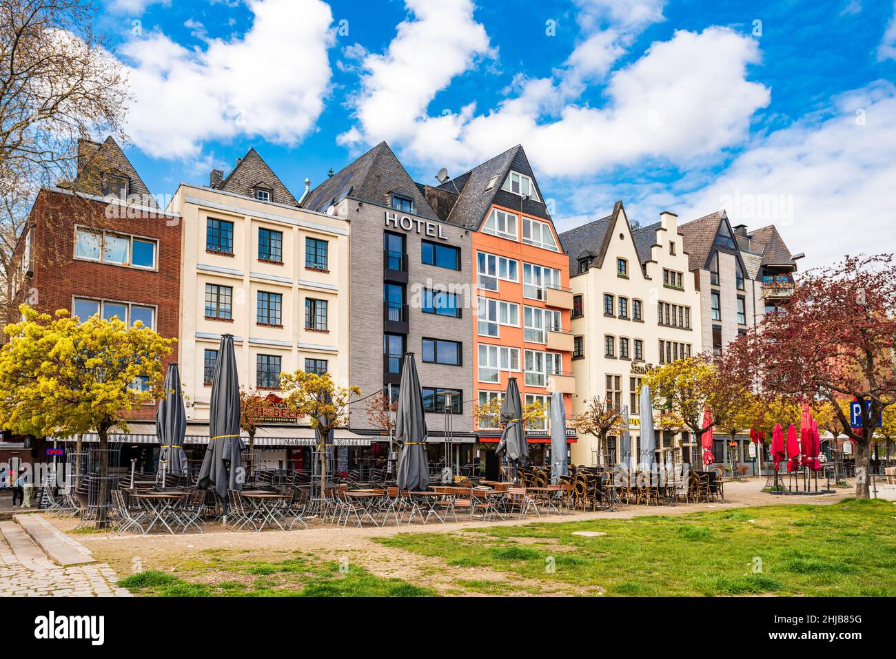 COLOGNE, GERMANY - April 17 2021: Old buildings on the Rhine embankment ...