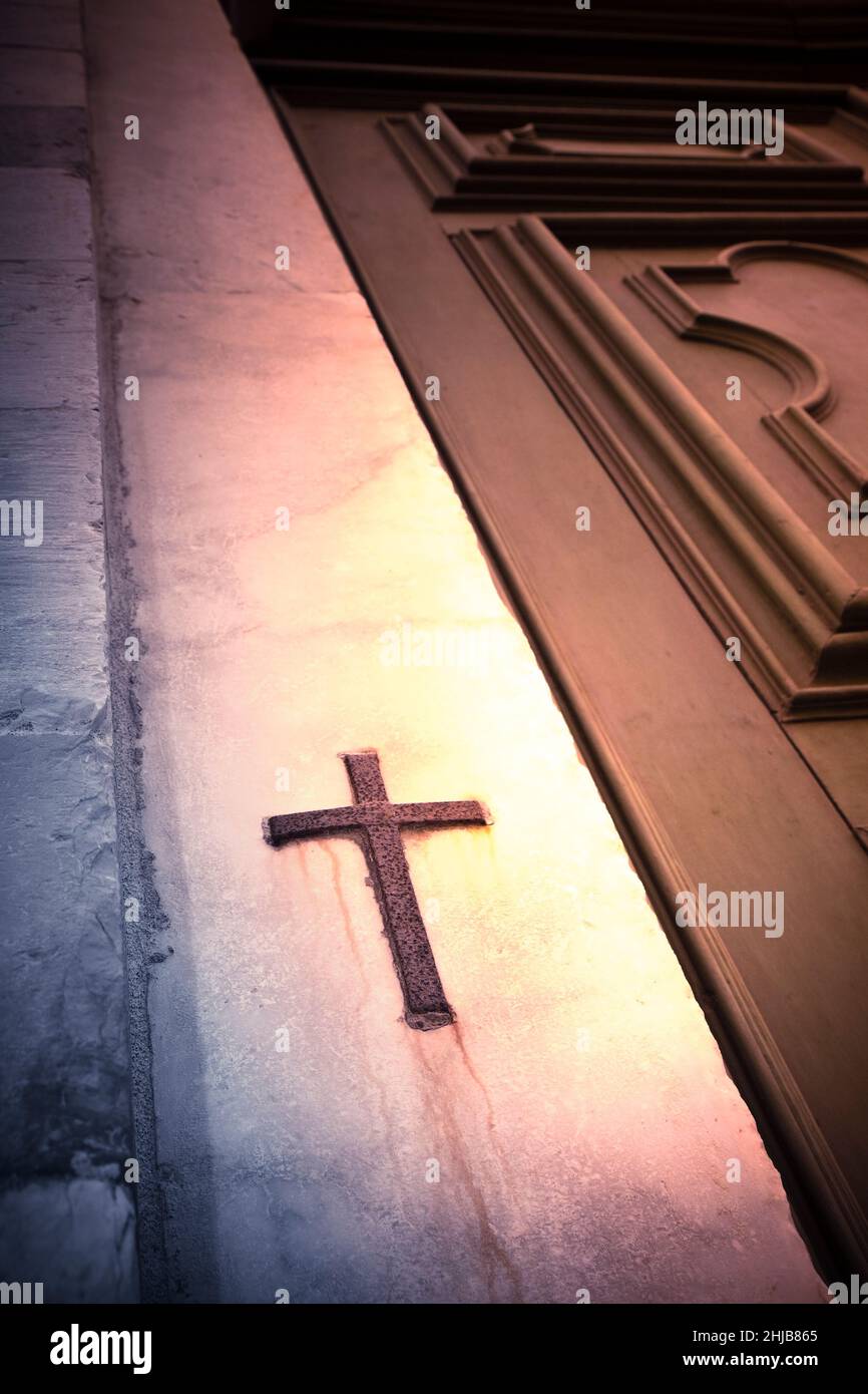 Iron cross snuggled in stone - concept image Stock Photo - Alamy