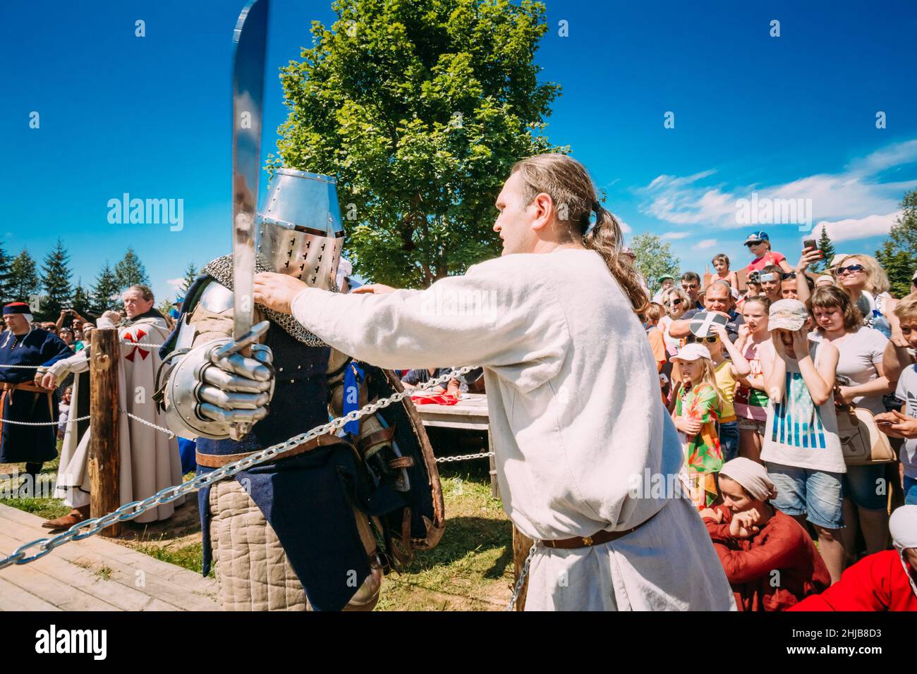 Knights In Fight With Sword. Restoration Of Knightly Battle Stock Photo ...