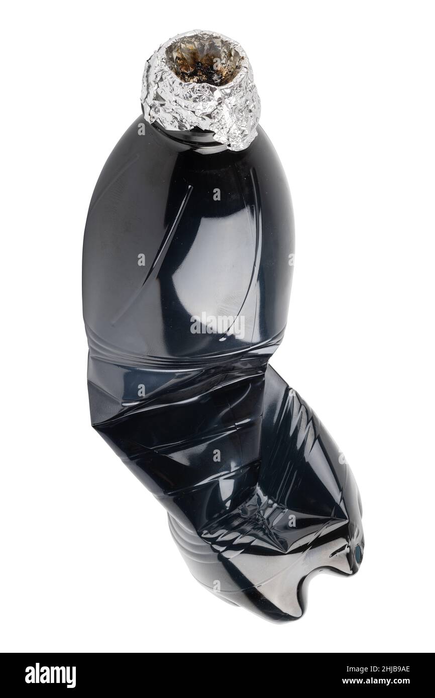 marijuana bong made from a plastic bottle and foil isolated on white ...