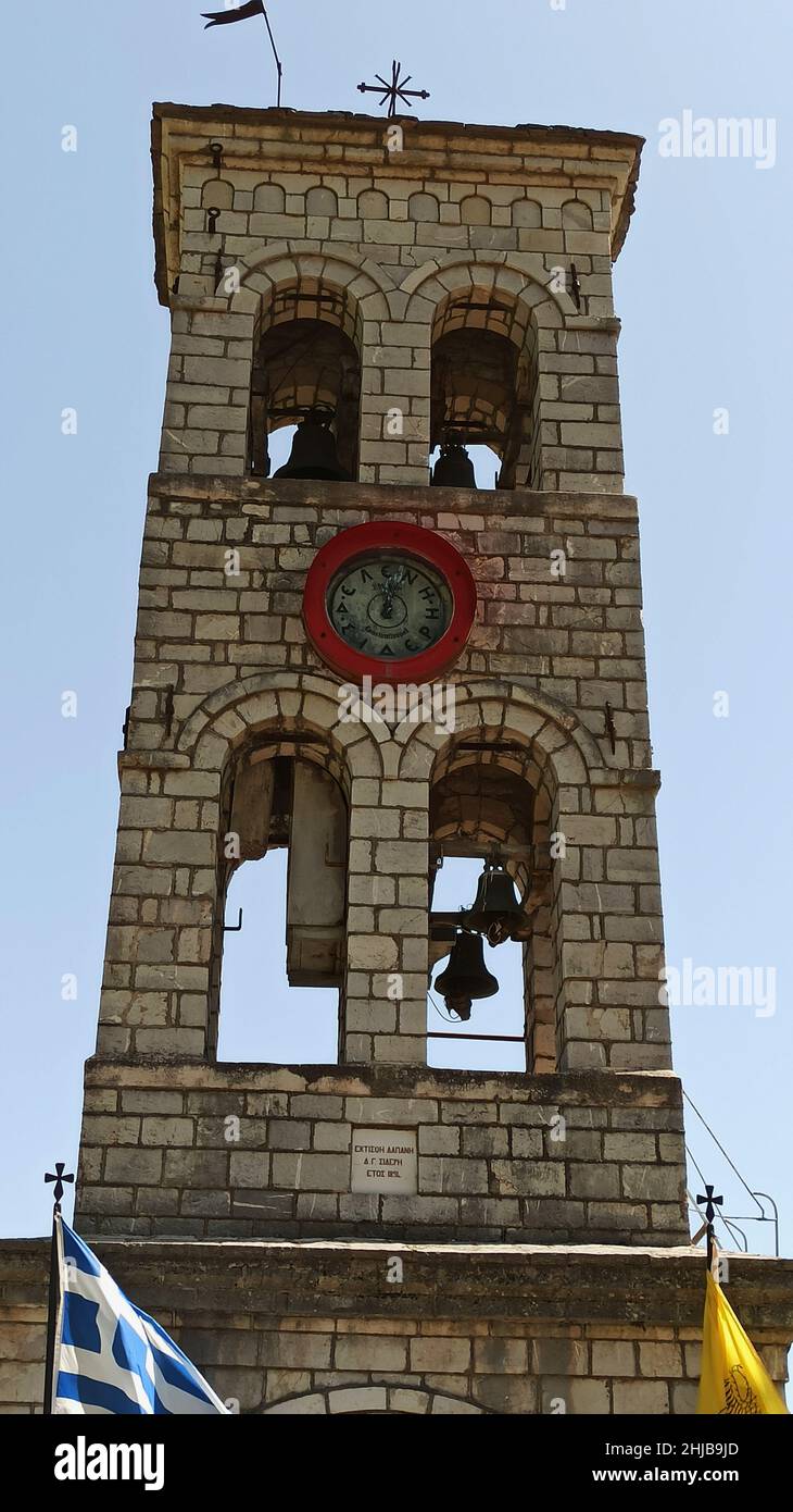 The bell tower in Mikro Chorio village at Karpenisi Greece Stock Photo ...