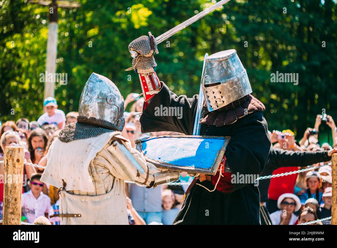Knights In Fight With Sword. Restoration Of Knightly Battle Stock Photo ...