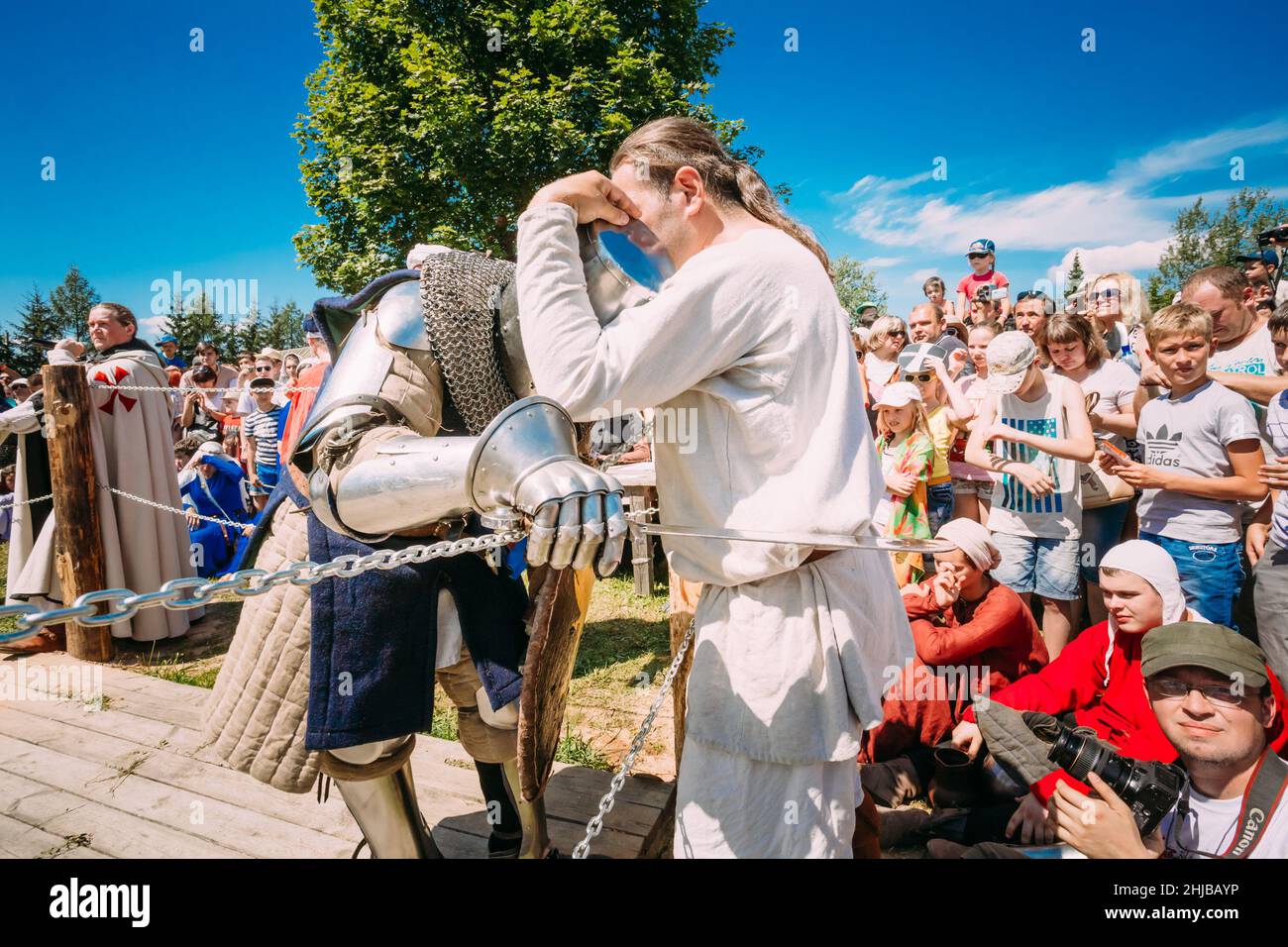 Knights In Fight With Sword. Restoration Of Knightly Battle Stock Photo ...