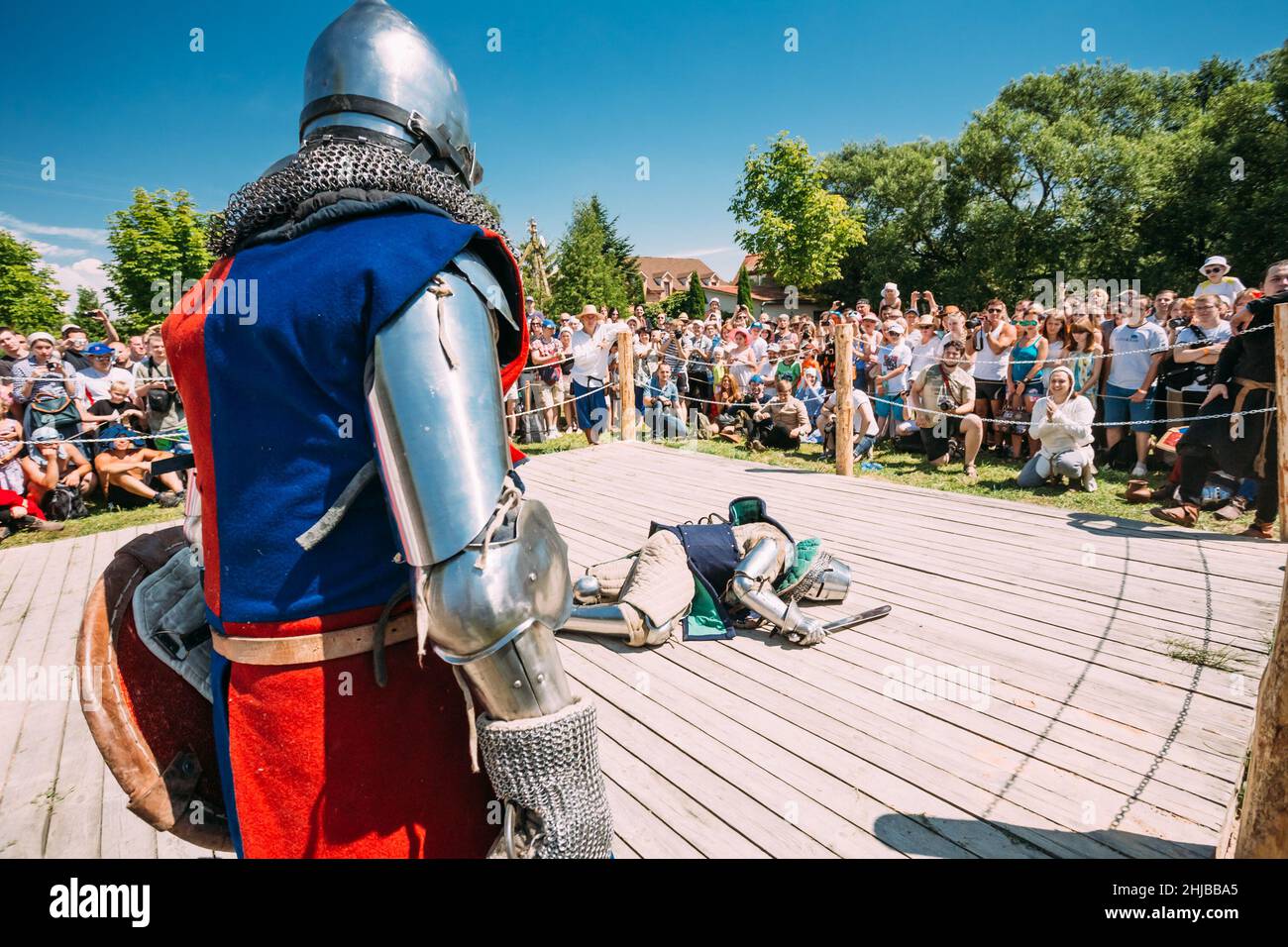 Knights In Fight With Sword. Restoration Of Knightly Battle Stock Photo ...