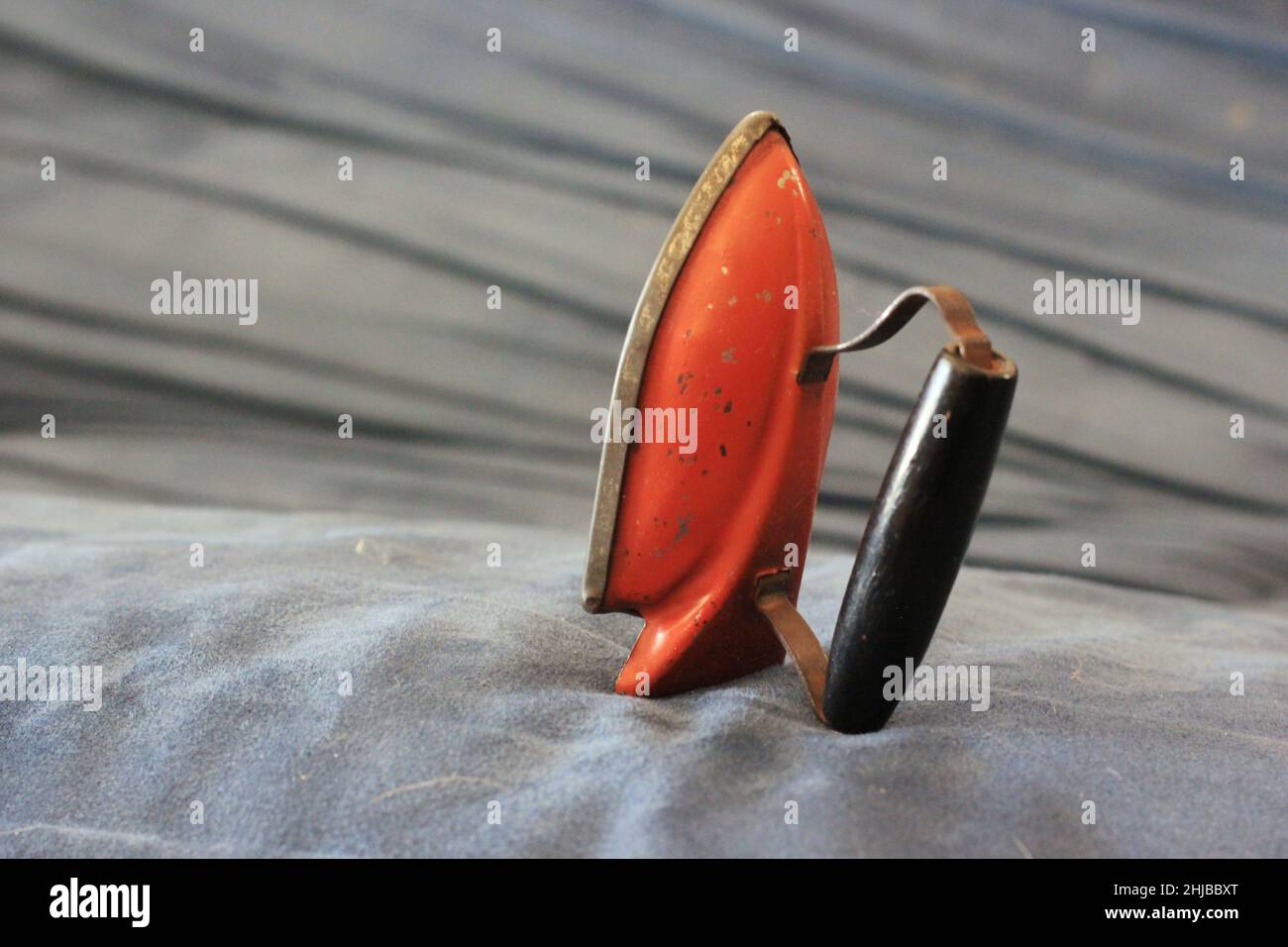 Vintage metal toy iron for kids to practice their domestic chores Stock ...