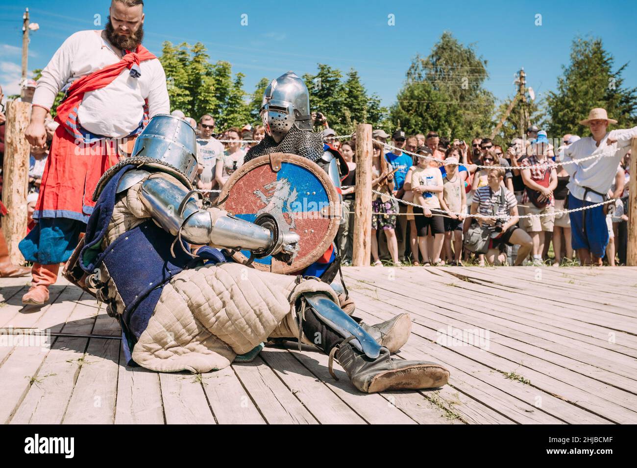 Knights In Fight With Sword. Restoration Of Knightly Battle Stock Photo ...