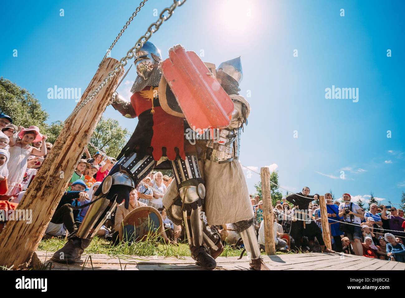 Knights In Fight With Sword. Restoration Of Knightly Battle Stock Photo ...