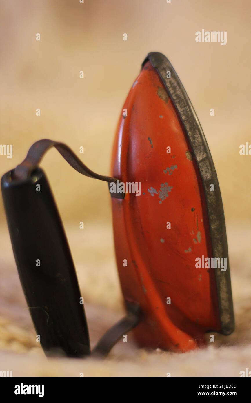 Vintage metal toy iron for kids to practice their domestic chores Stock ...