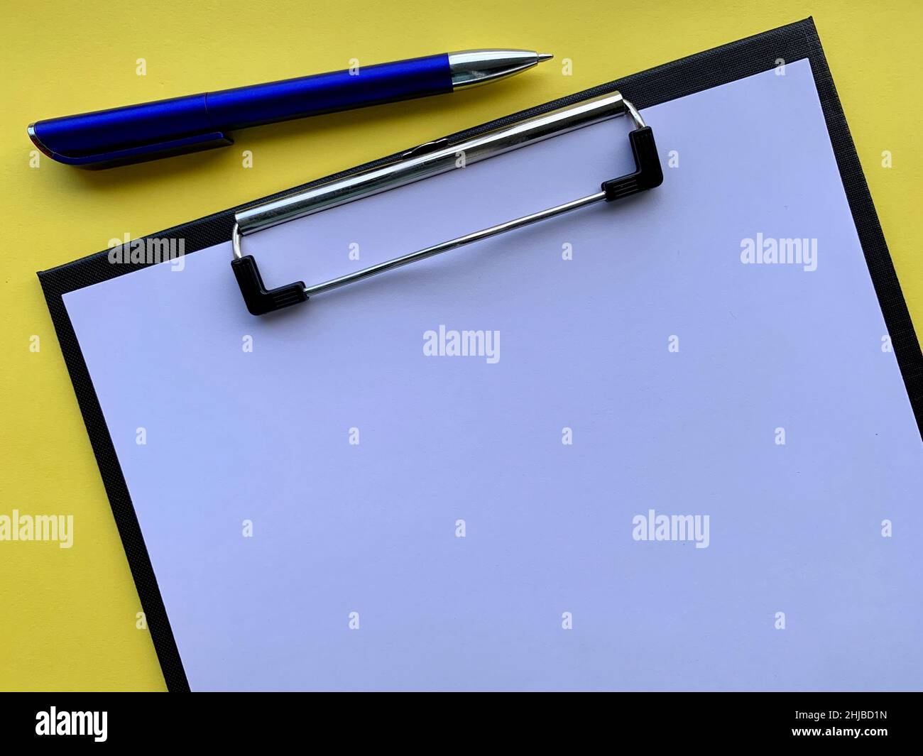Blank paper waiting for idea. Office concept Stock Photo - Alamy