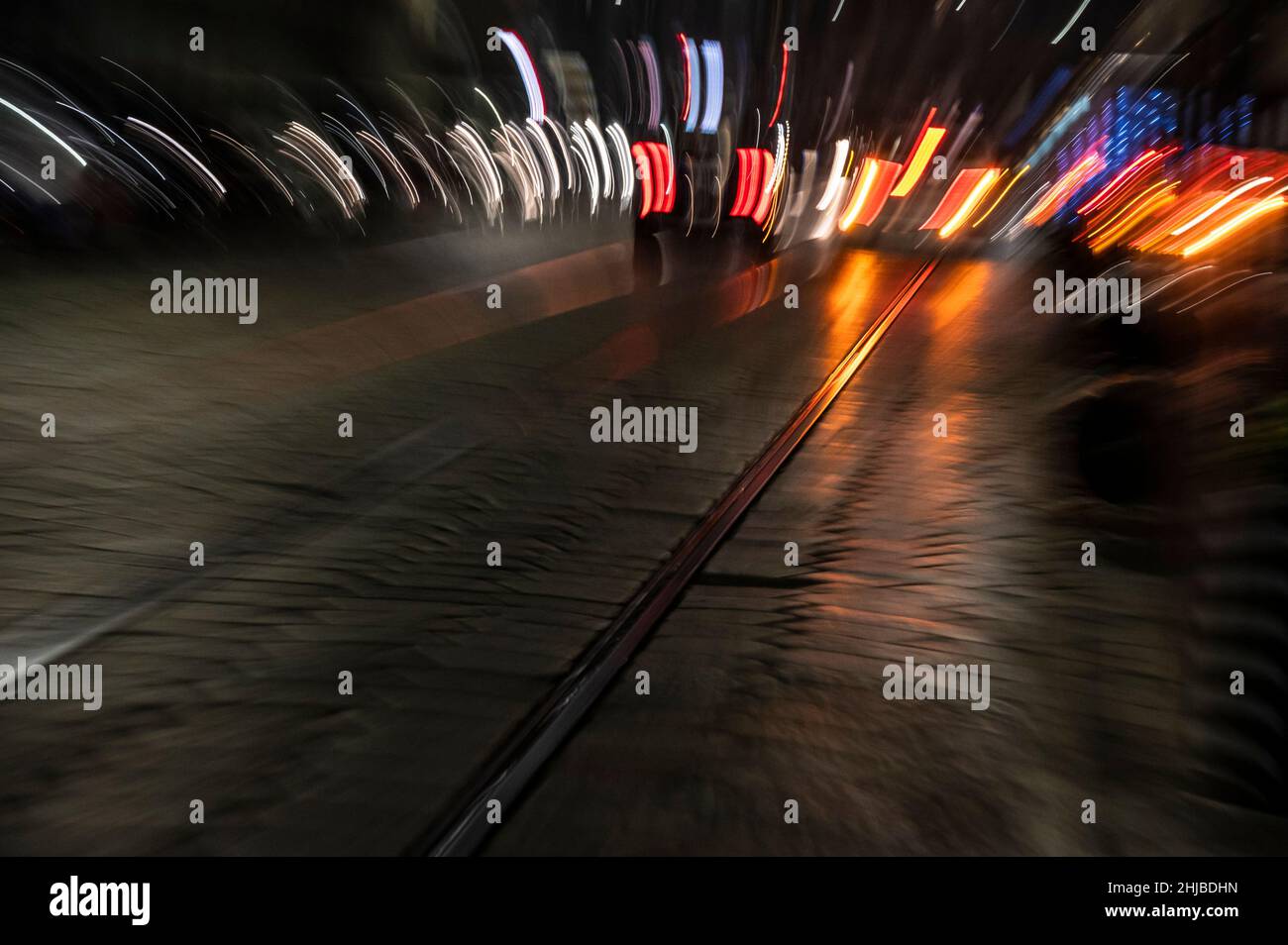 City streets activity by night Stock Photo - Alamy