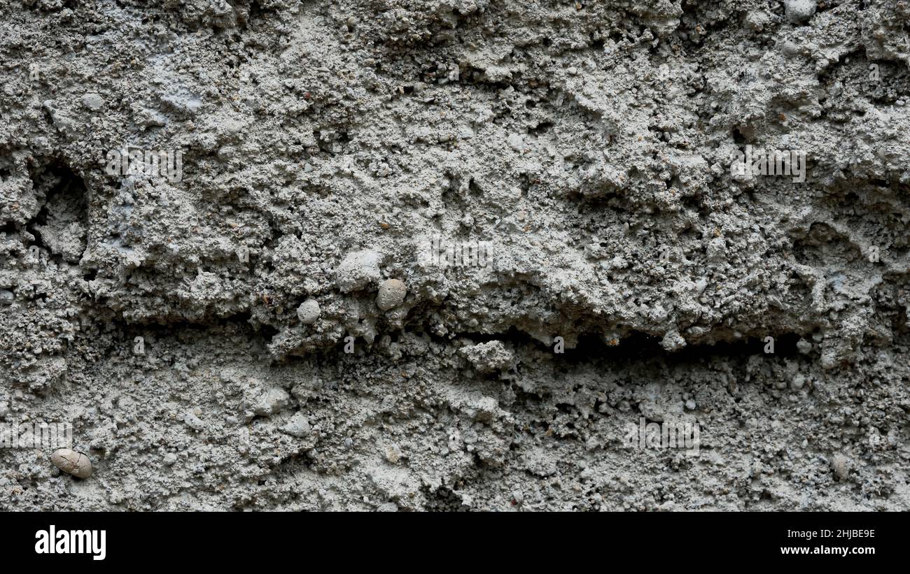 a gray concrete texture background. rough wall surface Stock Photo - Alamy