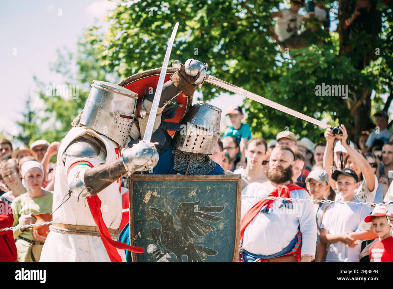 Knights In Fight With Sword. Restoration Of Knightly Battle Stock Photo ...