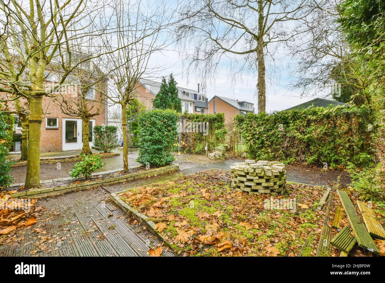 Superb courtyard with beautifully laid paths and trees Stock Photo - Alamy