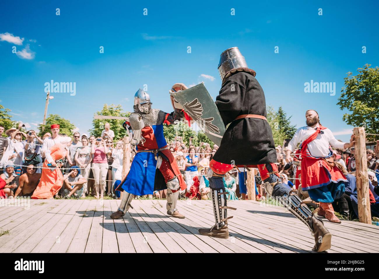 Knights In Fight With Sword. Restoration Of Knightly Battle Stock Photo ...