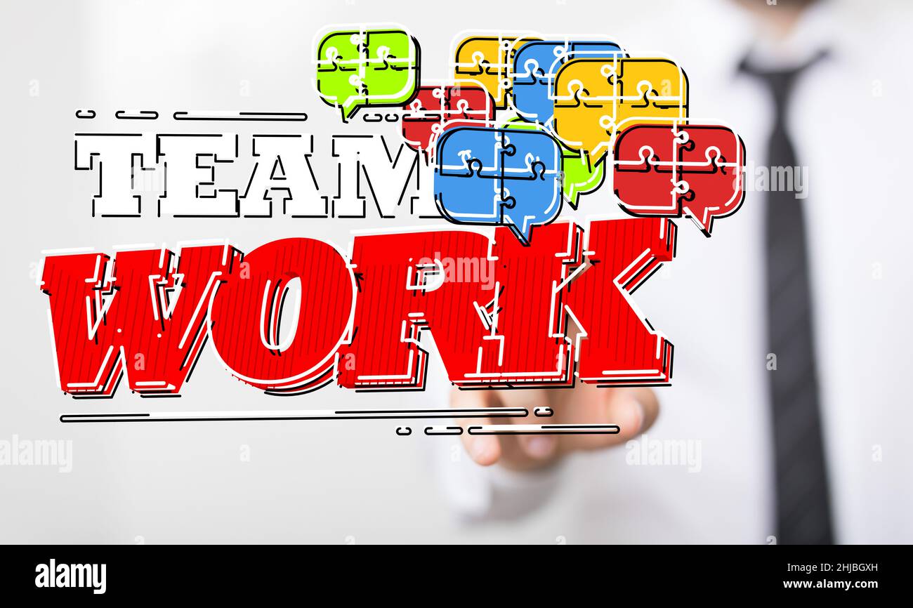 Person presenting a 3D render of Teamwork sign Stock Photo - Alamy