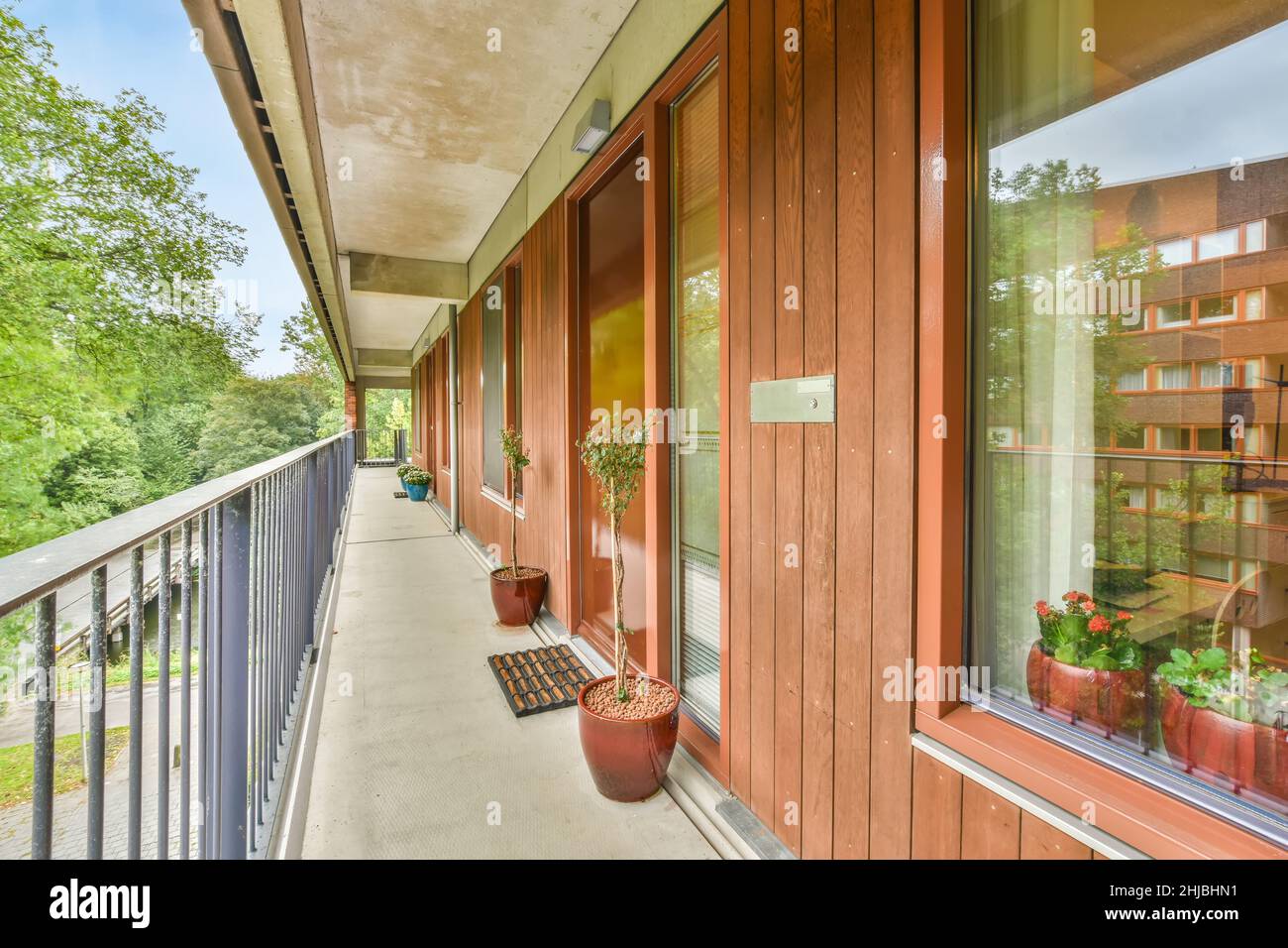 Balcony of a beautiful house in the daytime Stock Photo - Alamy
