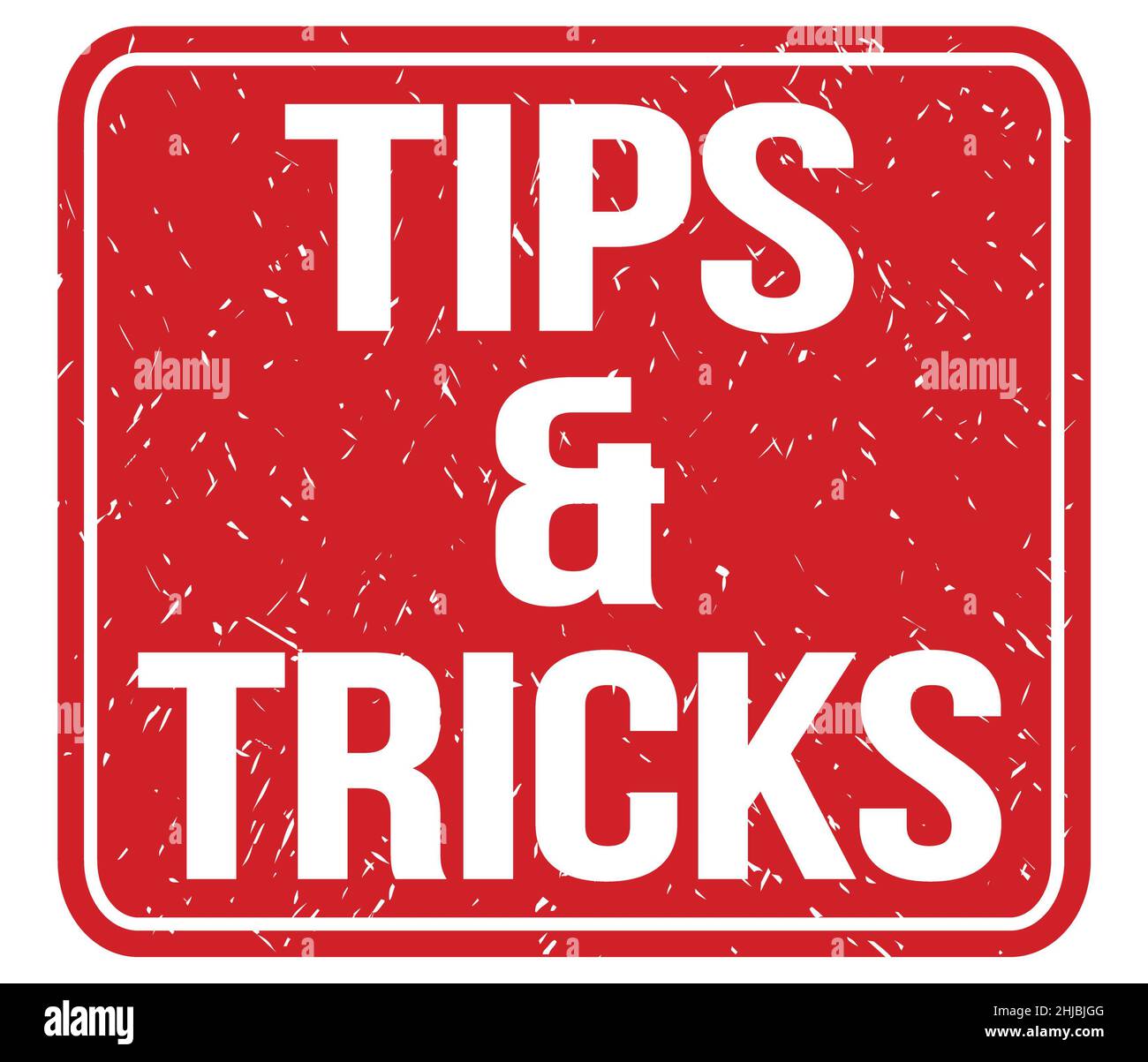 TIPS & TRICKS, text written on red vintage stamp sign Stock Photo - Alamy
